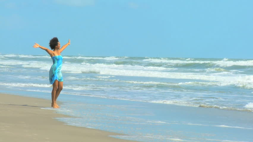 Stock video of beautiful african american female walking beach ...