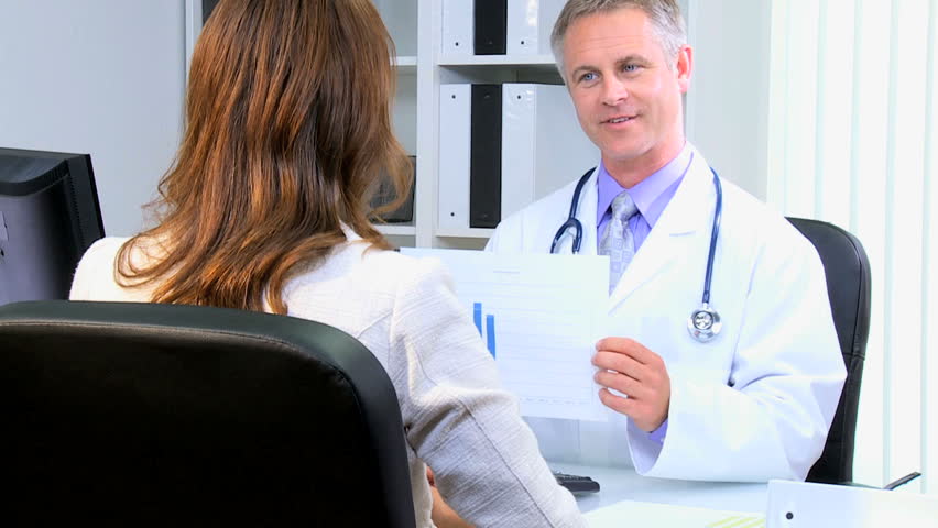 Female Pharmaceutical Representative Discussing Clinical Trial Results ...