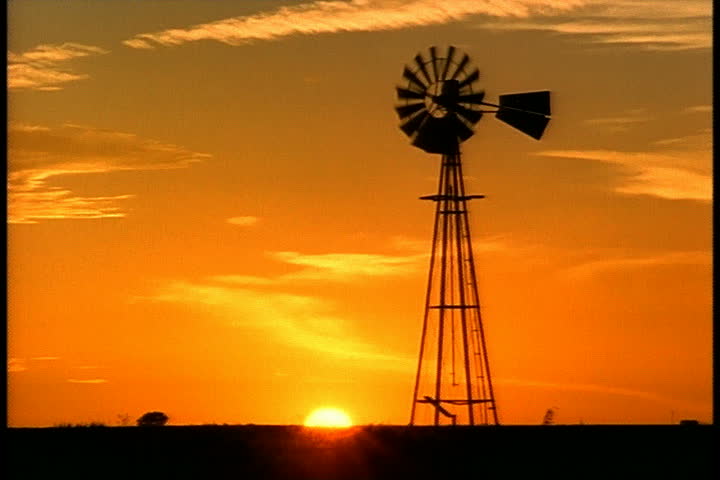 Silhouette Of Old Farm Wind Pump With Streaky Sunset In Oklahoma ...