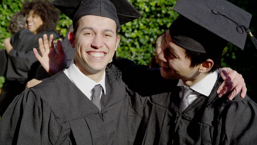 Stock video of portrait of 2 happy male graduates | 4375841 | Shutterstock