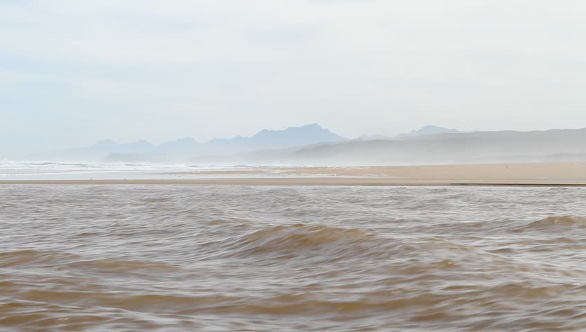 River Flows Into the Ocean Stock Footage Video (100% Royalty-free ...