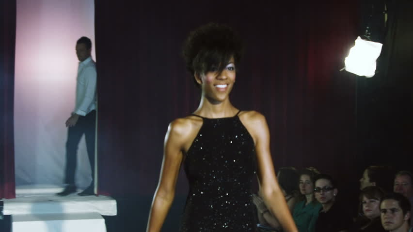 Good Looking Models Walk Down On The Catwalk And Audience Applaud In ...