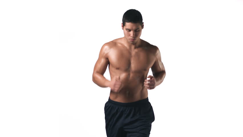Medium Shot Of An Athletic Ethnic Man Running On A Treadmill, On A ...