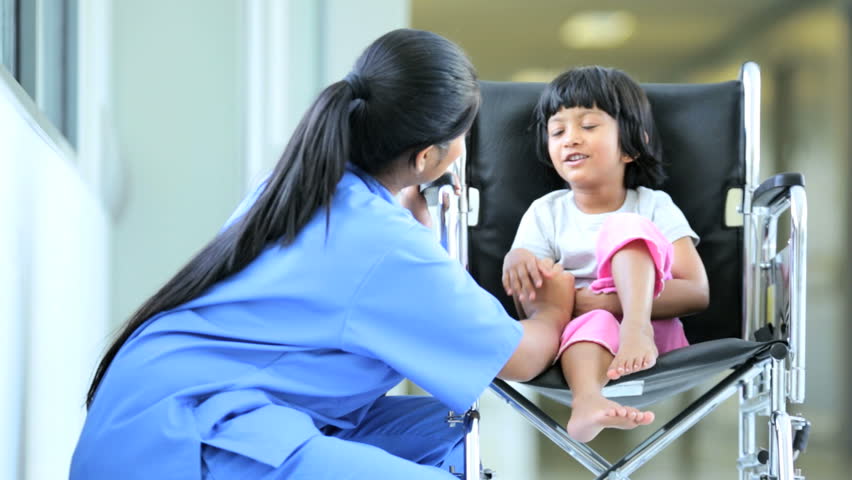 Stock video of devoted female medical aide reassuring little | 4808201 ...