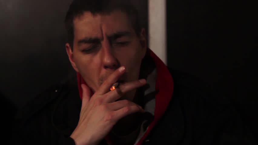 Stock video of the guy burning and smoking marijuana | 5486231 ...