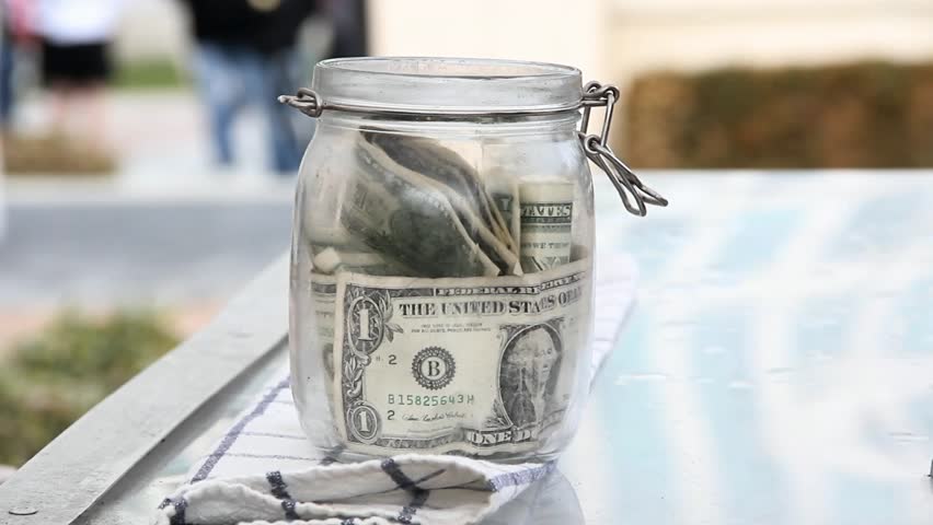 Almost Full Tip Jar of Stock Footage Video (100% Royalty-free) 5542121 ...