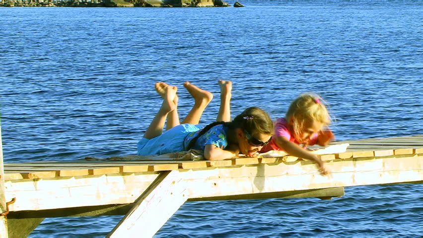 Two Girls Lie On a Stock Footage Video (100% Royalty-free) 616261 ...