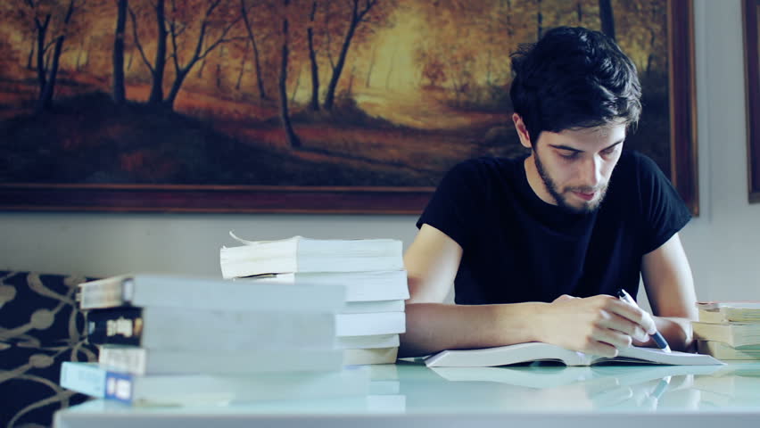 Young Casual Man Studying From A Book Stock Footage Video 6206333 ...