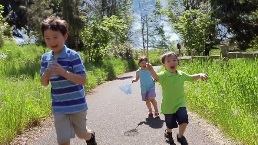 Stock video of excited little kids run with butterfly | 6393911 ...