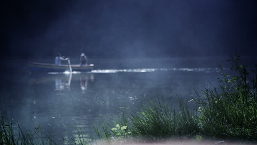 Man Rowing Woman In Row Boat On Lake At Night Stock Footage Video ...
