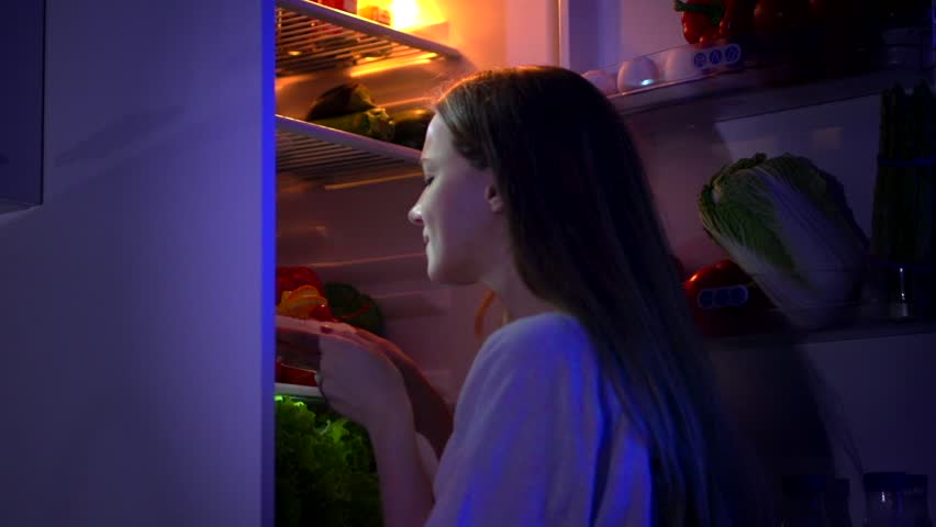 Stock Video Clip of Pretty teenage girl sneaking at night to | Shutterstock