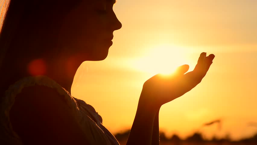 Stock video of sun in hands. woman hand catching | 6741421 | Shutterstock