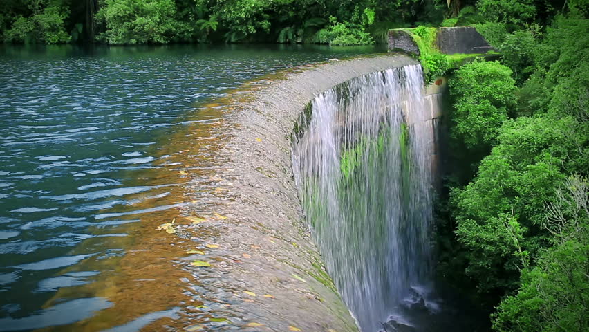 Stockvideo-Clip von A wall of water flows from an | Shutterstock