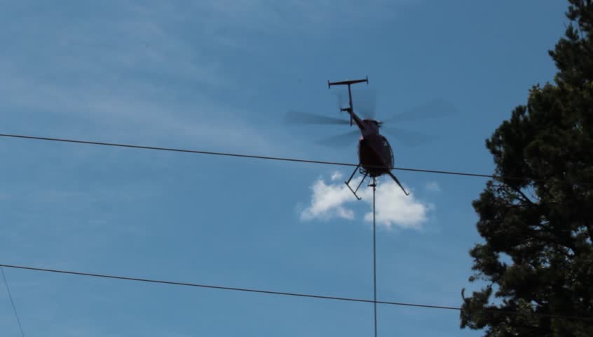 Helicopter with Suspended Tree Trimmer Stock Footage Video (100% ...