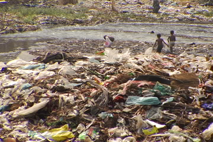 Stock video of children digging through trash on the | 746461 ...