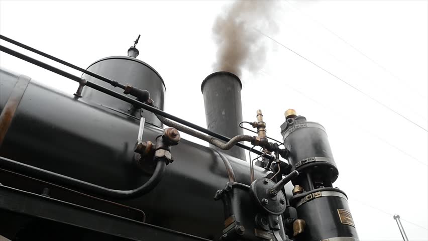 Stock video of old black locomotive. steam smoking in | 7881931 ...