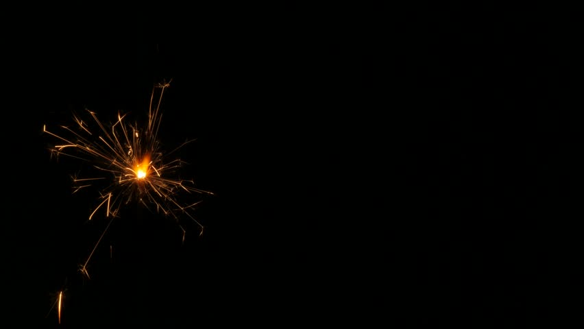 Burning Sparkler On Black Background. Small Fireworks Giving Off Sparks ...