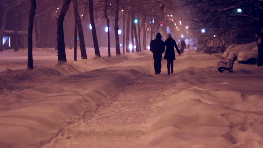 Stock Video Clip of City Winter Night. People Walking On Snowy ...