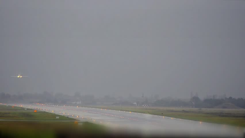 Airplane Arrives at Foggy Rain Stock Footage Video (100% Royalty-free ...