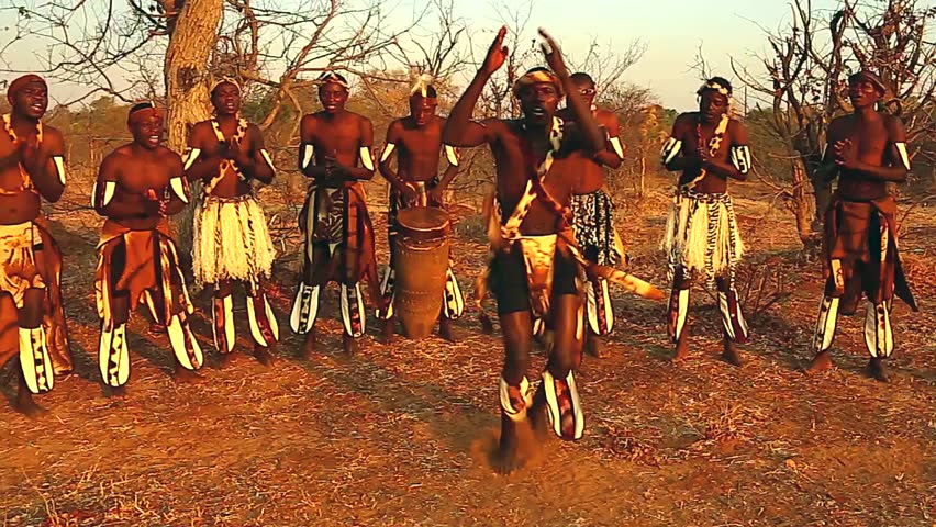 Traditionally Dressed African Tribesmen Of The Herero Tribe Dance And ...