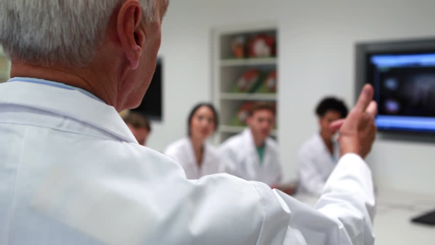 Medical Professor Teaching Young Students Stock Footage Video (100% ...
