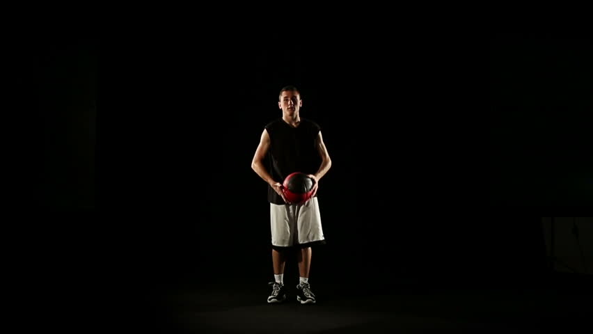 Businessman Standing With His Luggage Against Black Background Stock ...