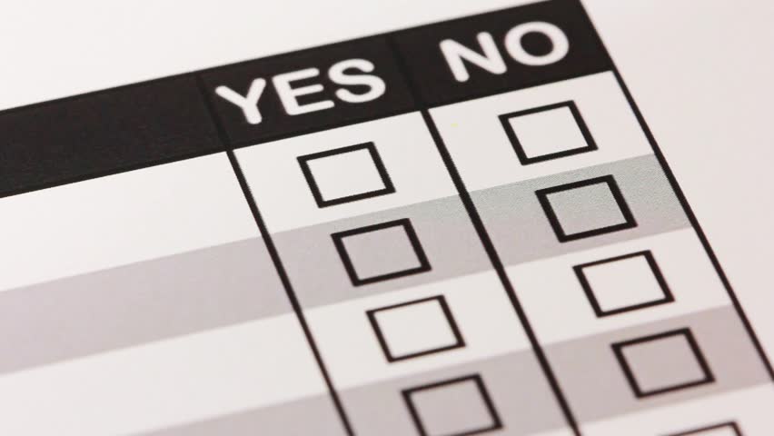 Hand Filling Yes And No At The Checklist Box. Close Up. Survey And Poll ...