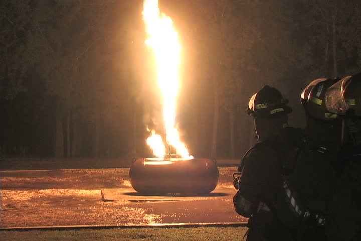 Closeup of Firefighters Battling a Stock Footage Video (100% Royalty ...