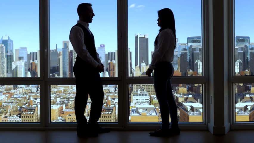 Two Businessman Having A Meeting Talking Together In Modern High Rise ...